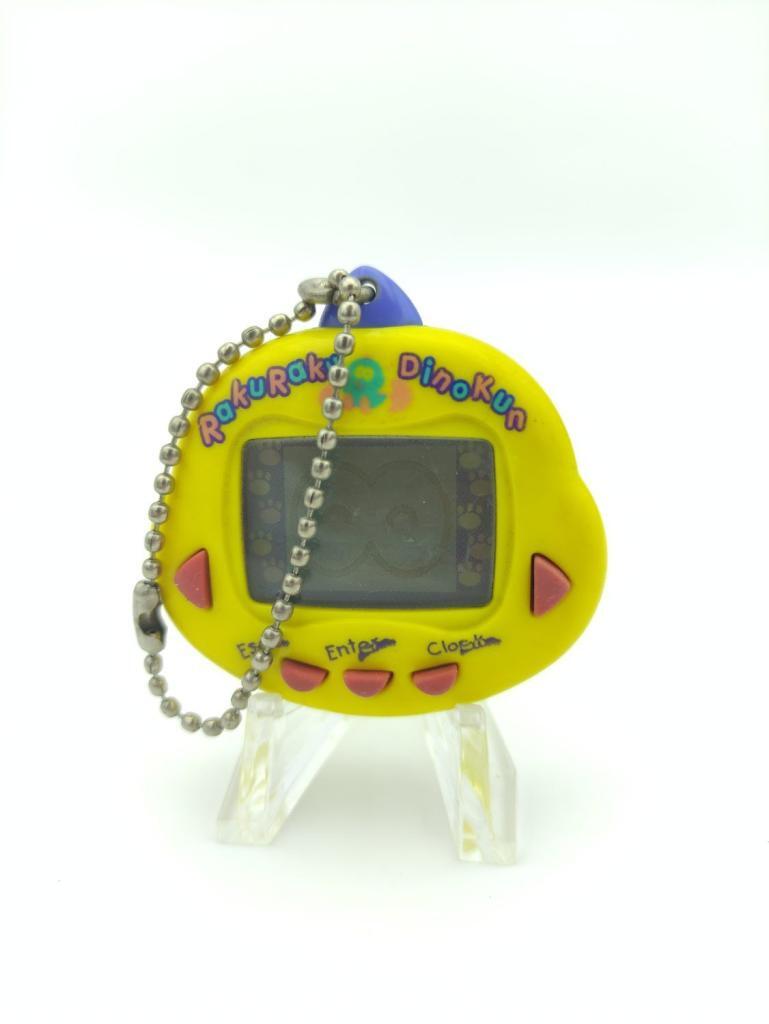 RakuRaku Dinokun Dinkie Dino White Pocket Game Virtual Pet Yellow - Buy ...